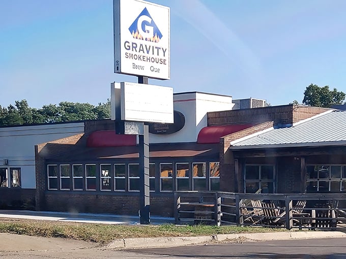 Blue skies or gray clouds, Gravity Smokehouse stands ready with its "Patio Open" promise &ndash; Michigan's BBQ beacon in brick and wood.