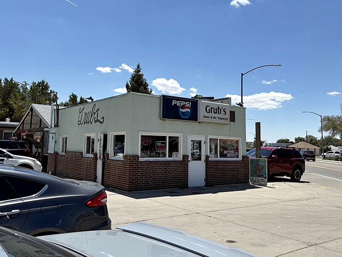 This unassuming white building with brick trim might not look fancy, but locals know Grub's Drive-In serves burger magic worth the trip.