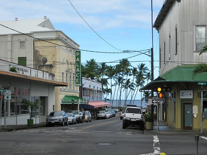 Downtown Hilo streets reveal small-town Hawaii charm, where palm trees sway and your wallet doesn't need therapy afterward.