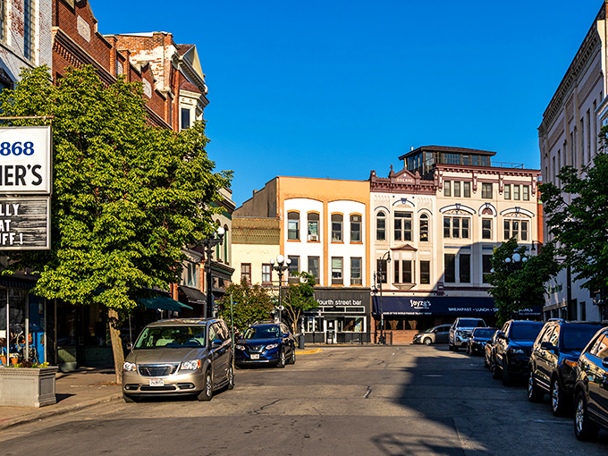 Sunlight bathes these century-old storefronts, where local businesses thrive in buildings that have seen it all.