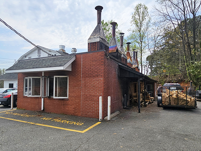 Those brick pits aren't just for show; they're where decades of smoky magic happens every single day.