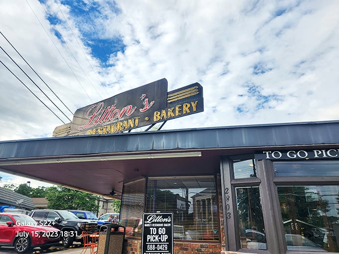 Litton's iconic neon sign welcomes hungry Knoxville locals to a burger paradise where fresh-baked buns make all the difference.