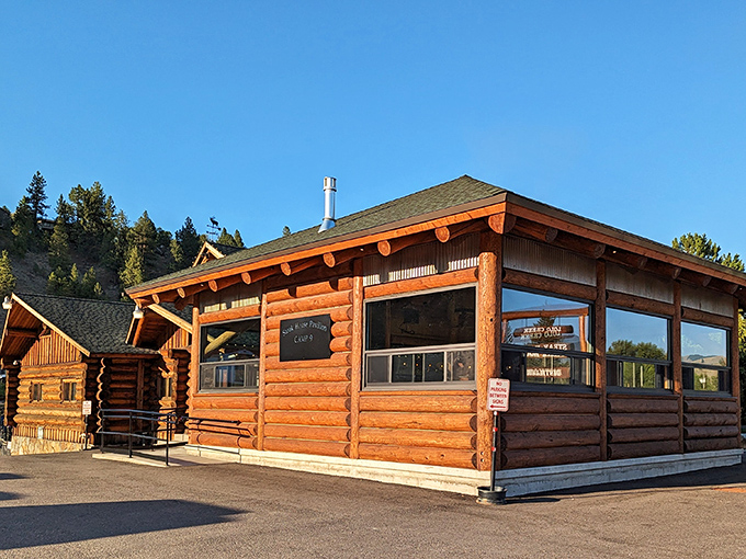 Sunshine gleams off this timber treasure. Inside those log walls, steaks sizzle while mountain views steal the show.