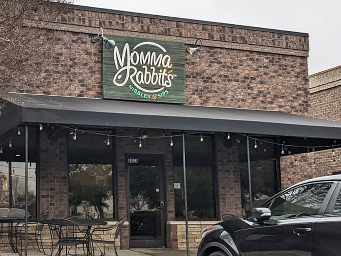 That green sign promises nibbles and sips, but delivers so much more than advertised.