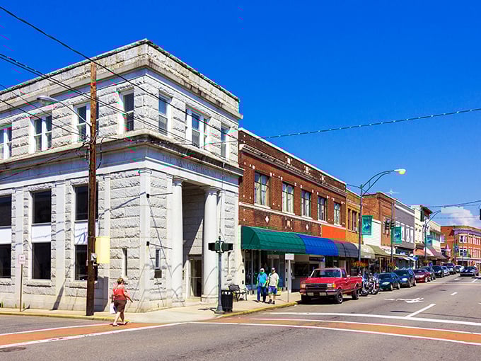 Classic brick storefronts line these welcoming streets like old friends gathering for Sunday dinner.