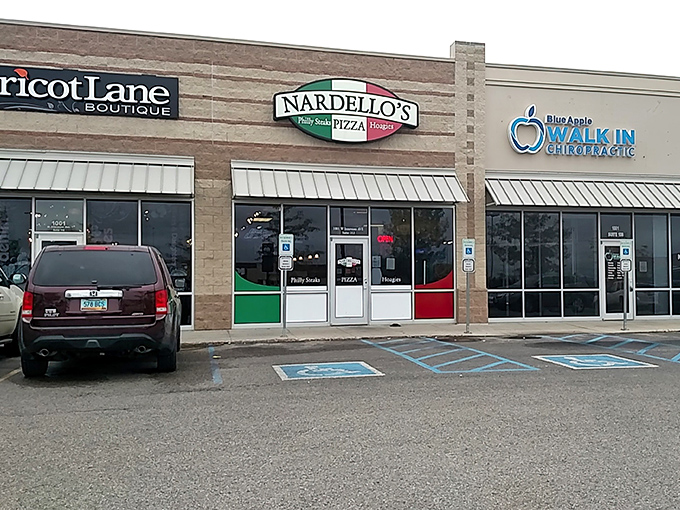 Those Italian flag colors on the storefront aren't just decoration - they're a delicious promise waiting inside. 