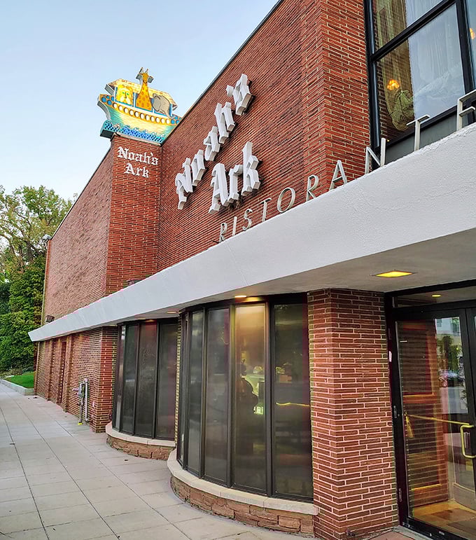 That crown-like boat sign atop Noah's Ark isn't just decoration—it's a beacon guiding hungry Des Moines pizza pilgrims home.