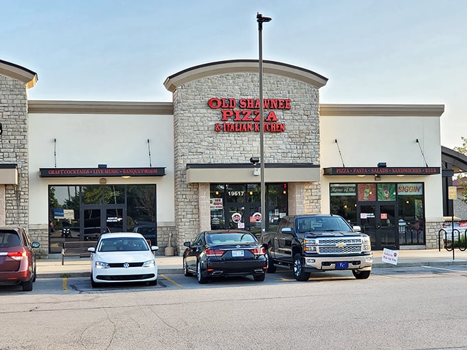 Where pizza dreams come true! That bold red sign promises old-school flavors that have kept locals coming back for generations.