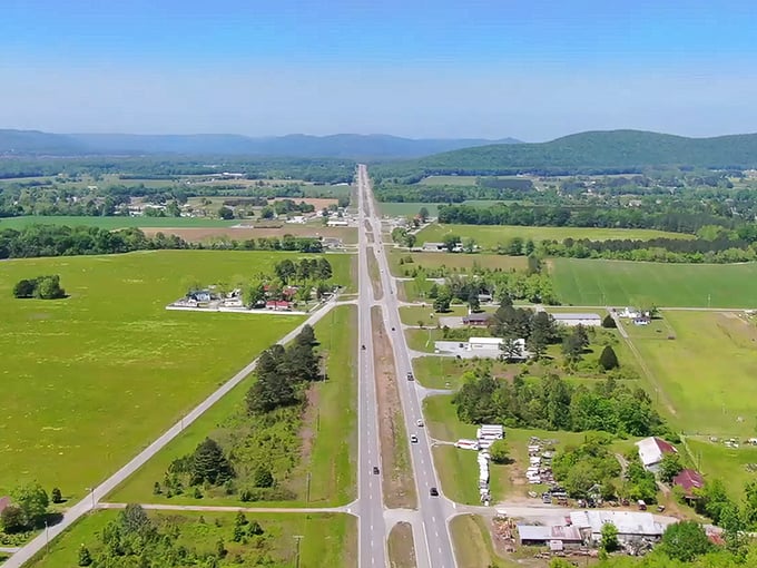 Rolling green fields stretch toward distant mountains, offering million-dollar views at bargain-basement prices. Nature's retirement gift.
