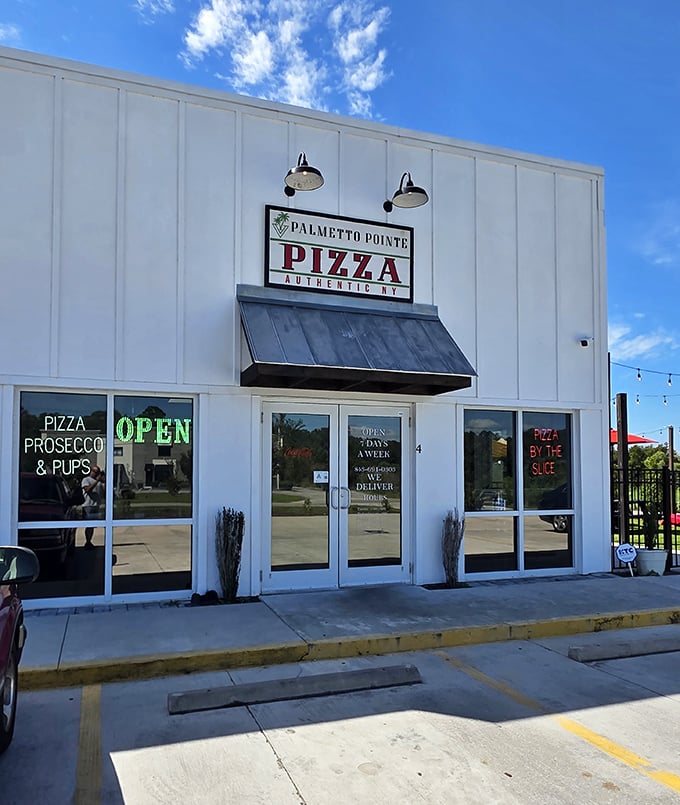 Neon signs beckon pizza lovers into this bright white sanctuary of slice perfection at Palmetto Pointe.