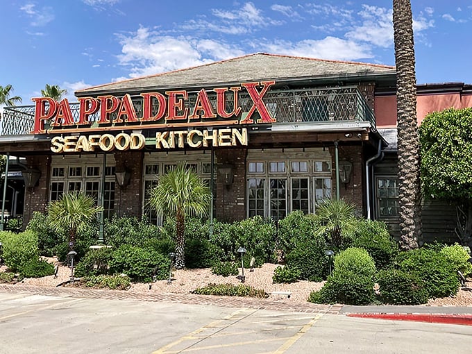 Louisiana charm meets Arizona sunshine at Pappadeaux. The brick facade and lush landscaping set the stage for the seafood feast waiting inside.