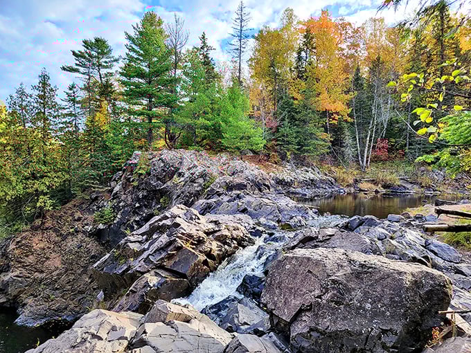 Fall's fashion show at Pattison Park&mdash;where the water dances over ancient rocks while trees flaunt their autumn couture.