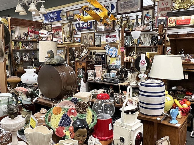 Treasure hunting paradise! Every shelf tells a story, and this booth looks like it's auditioning for "Hoarders: Museum Edition."