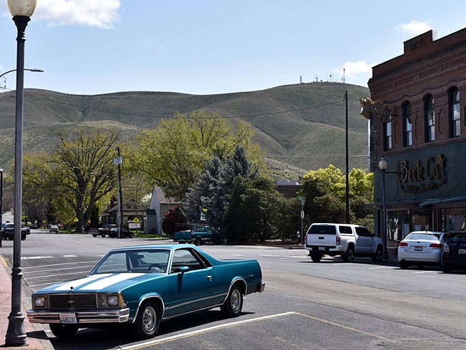 Prosser's rolling hills cradle the town like nature's amphitheater. That vintage El Camino adds just the right touch of timeless Americana.