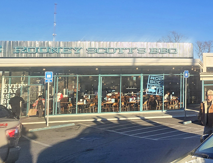 Sunlight streams through the windows at Rodney Scott's, where modern design meets old-school BBQ in a space that feels like a neighborhood party.