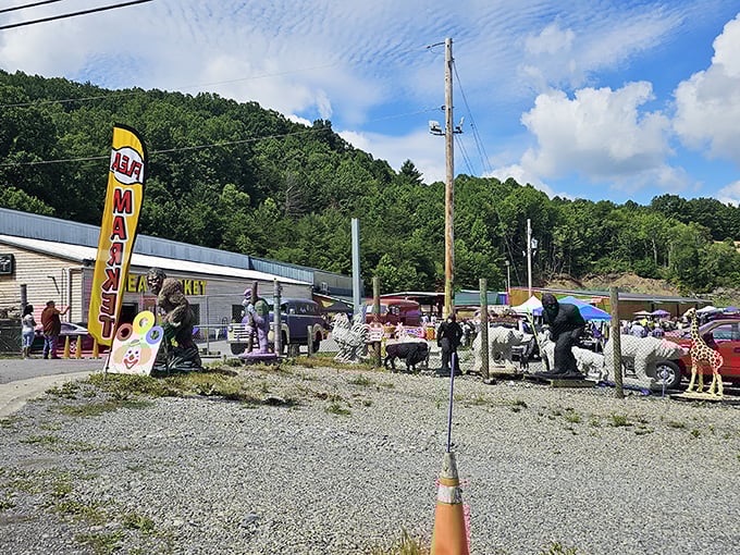 Rolling hills frame this bustling flea market where vendors and shoppers gather for weekend treasure hunting adventures.
