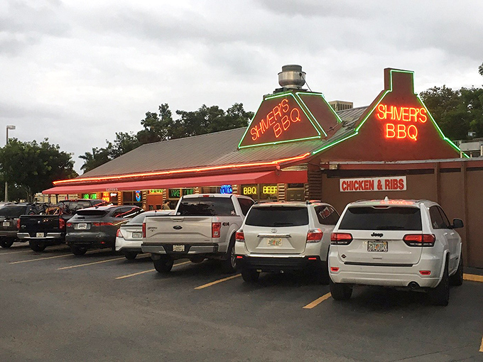 The parking lot's full at Shiver's for good reason. That red neon sign has been guiding hungry locals to smoky paradise for decades.
