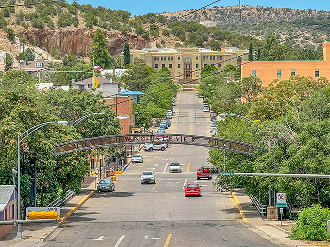 Silver City's welcoming streets invite you to wander beneath the "Downtown Silver City" arch, where mountain views frame every adventure.