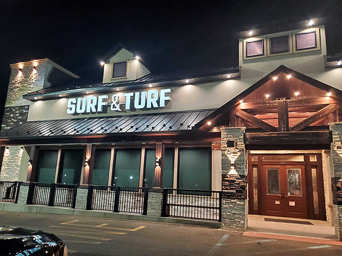 "Surf & Turf" illuminated against the night sky &ndash; like a beacon calling all hungry travelers home.
