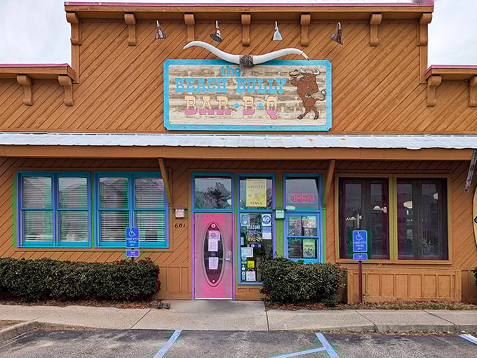 That pink door isn't just an entrance&mdash;it's a portal to smoky paradise where beach vibes meet serious BBQ business.