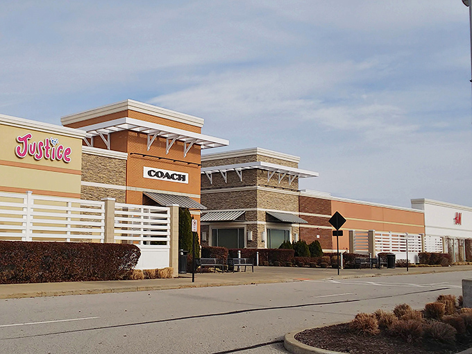 Brand names like Coach beckon shoppers to discover luxury deals in comfortable surroundings.