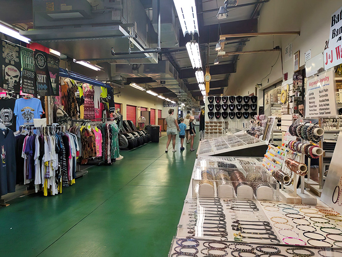 T-shirts, jewelry, and collectibles line this corridor where shoppers can find everything from pop culture memorabilia to everyday essentials.