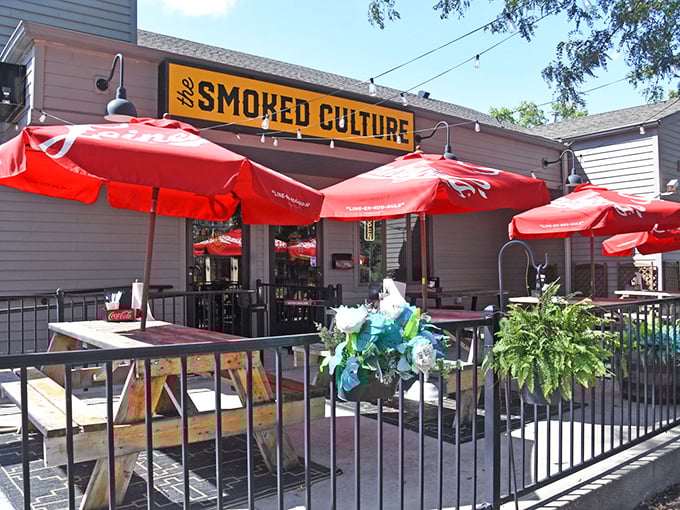 Red umbrellas create the perfect spot for enjoying BBQ while pretending you're on vacation in your own town.