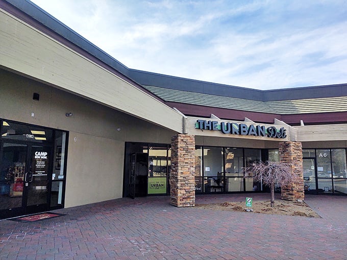 Modern meets cozy at The Urban Deli, where those stone columns guard treasures of bread and filling.
