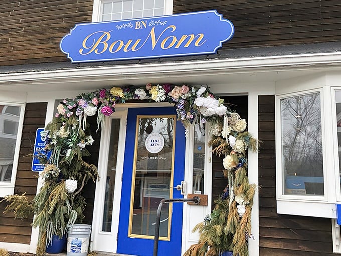 Seasonal decorations transform BouNom's entrance into a floral fantasy, proving Connecticut bakeries can do charm as well as carbs.