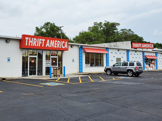 Parking spots empty and ready for thrift enthusiasts. This unassuming storefront holds more potential than a lottery ticket with better odds!