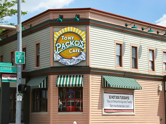 The green-striped awnings of Tony Packo's beckon hungry visitors like a hot dog lighthouse in a sea of ordinary fast food.