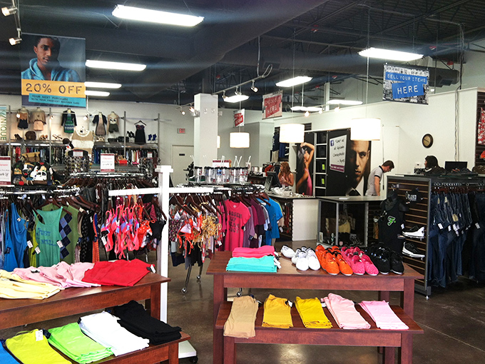 Inside Uptown Cheapskate, a rainbow of organized clothing awaits. Treasure hunting has never looked so tidy!