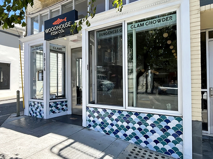 The seafood siren call of Woodhouse Fish Co. &ndash; where "Lobster Roll" and "Clam Chowder" on the window are better than any neon "Open" sign.