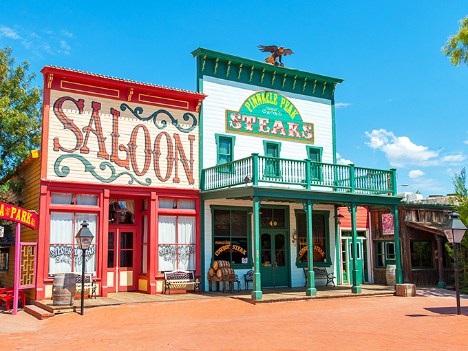 Architectural showdown: The green-trimmed steakhouse stands proudly beside its red saloon neighbor, like the culinary equivalent of a Western standoff.