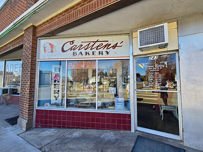 Classic red-tiled facade and hand-painted signage&mdash;some traditions are worth preserving, especially when donuts are involved.