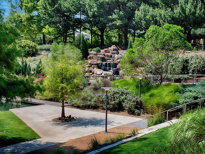 Tranquility by design&mdash;stone pathways lead visitors through meticulously planned greenery where every plant seems to have found its perfect home.