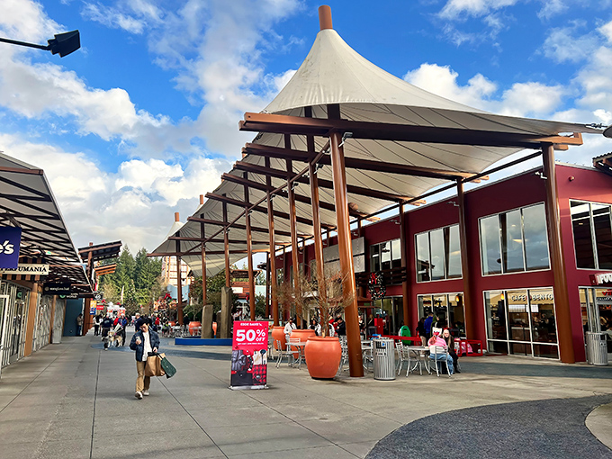 The modern outdoor design combines Northwest architectural elements with practical covered walkways&mdash;because rain and shopping bags don't mix well.