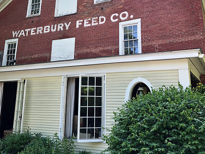 The yellow clapboard addition brings a touch of sunshine to the historic feed mill, creating an inviting entrance to food paradise.