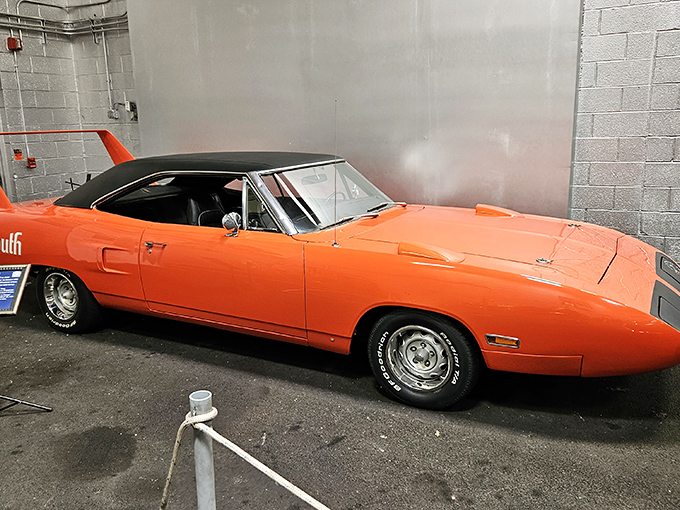 This vibrant orange 1970 Plymouth Superbird isn't just a car &ndash; it's a time machine to an era when aerodynamics meant "slap a ridiculous wing on it and see what happens."