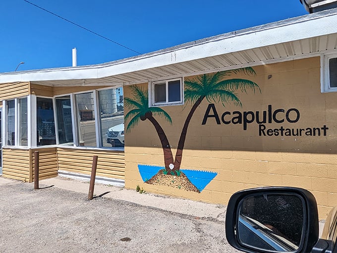 Acapulco Restaurant brings a splash of Mexican sunshine to Idaho's Magic Valley, with palm trees painted on the exterior promising tropical flavors inside.