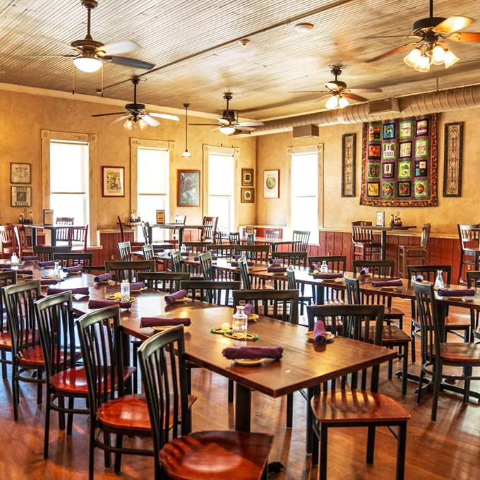 Warm golden walls, wooden tables, and ceiling fans spinning lazily overhead &ndash; the dining room feels like your favorite aunt's house, if she happened to be a Cajun cooking genius.