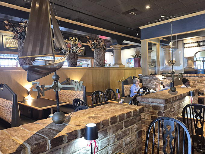 Nautical touches and brick dividers create cozy dining nooks where conversations flow as freely as the drinks and laughter.