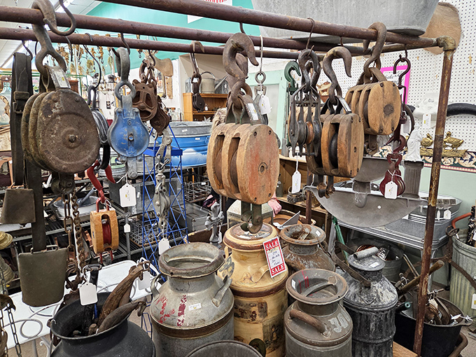These weathered pulleys and milk cans aren't just rusty relics; they're industrial poetry from an era when everything was built to last.