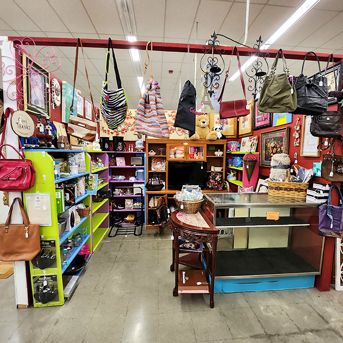 Handbags from every decade imaginable hang like colorful time capsules, each one with stories to tell.