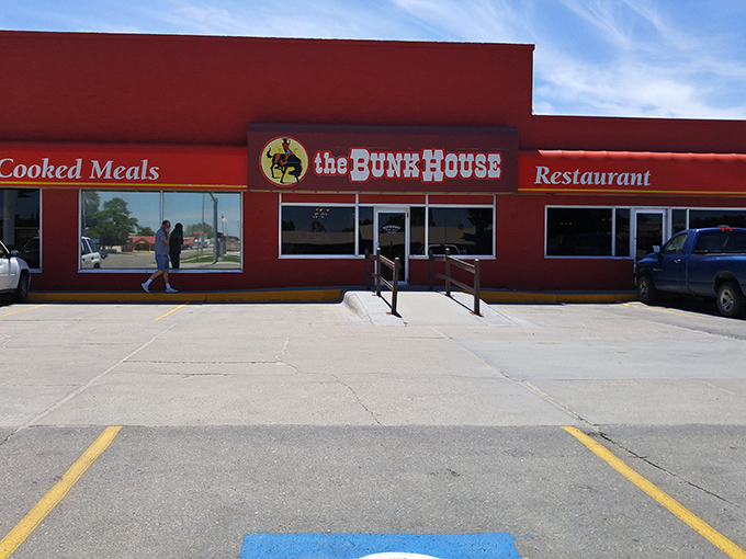 The Bunkhouse Restaurant's vibrant red exterior promises what every road-weary traveler dreams of: home-style cooking that sticks to your ribs.