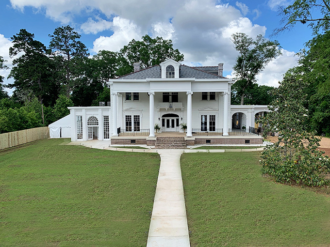 This stately white mansion exemplifies the architectural grandeur that makes Brookhaven's historic homes both impressive and surprisingly affordable for retirees seeking Southern elegance.