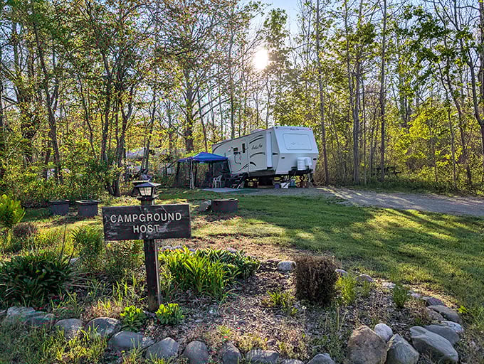 Home sweet temporary home! The campground host site welcomes weary travelers to this woodland retreat where nature provides the five-star amenities.