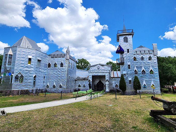Under perfect blue skies, this metallic medieval fantasy stands proudly in Ona, proving that one person's newspaper printing plates are another's castle walls.