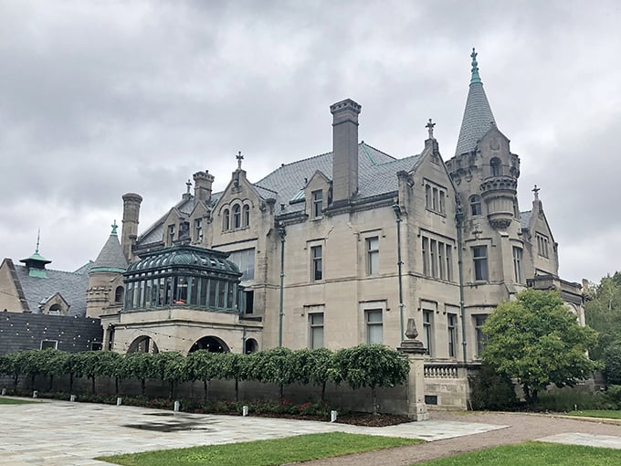 Even on cloudy days, this architectural masterpiece commands attention, its stone façade and dramatic silhouette transforming a Minneapolis street into a scene from a European fairytale.