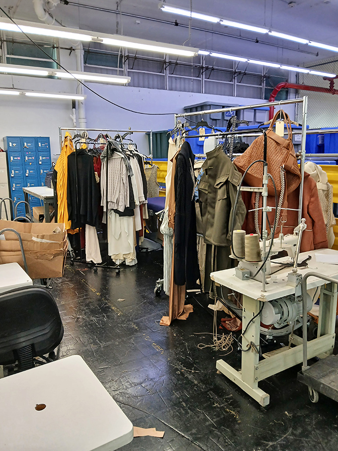Behind the scenes, clothing gets sorted and prepped. Like a fashion laboratory where yesterday's styles await their second chance.